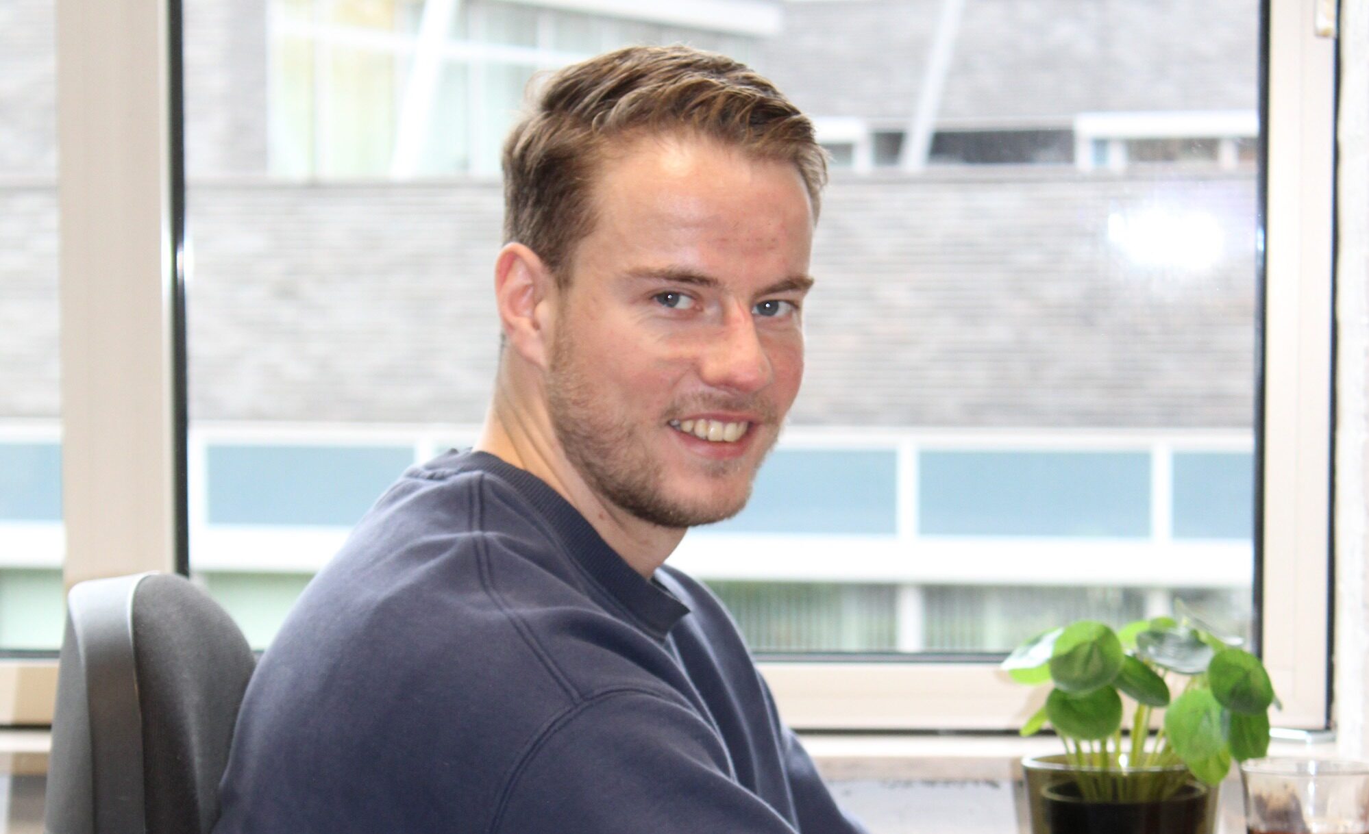 Software engineer bij AT-Automation: John over groei en projecten